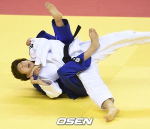 정보경, 女 48kg급 '한판' 거두며 결승진출 - OSEN