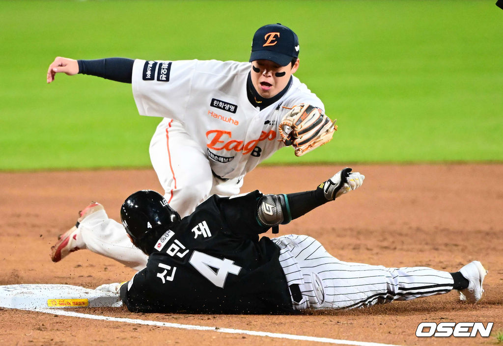 무협 영화 뺨친 3루 혈투…노시환-신민재, 집중력이 빚어낸 명장면[지형준의 Behind] - OSEN