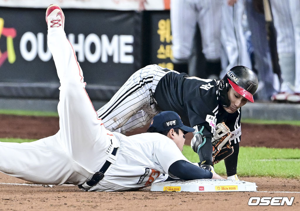 무협 영화 뺨친 3루 혈투…노시환-신민재, 집중력이 빚어낸 명장면[지형준의 Behind] - OSEN